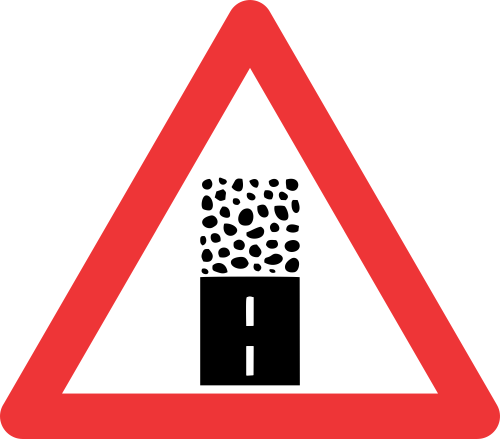 W325 - Gravel Road Begins Road Sign | Safety Signs & Equipment
